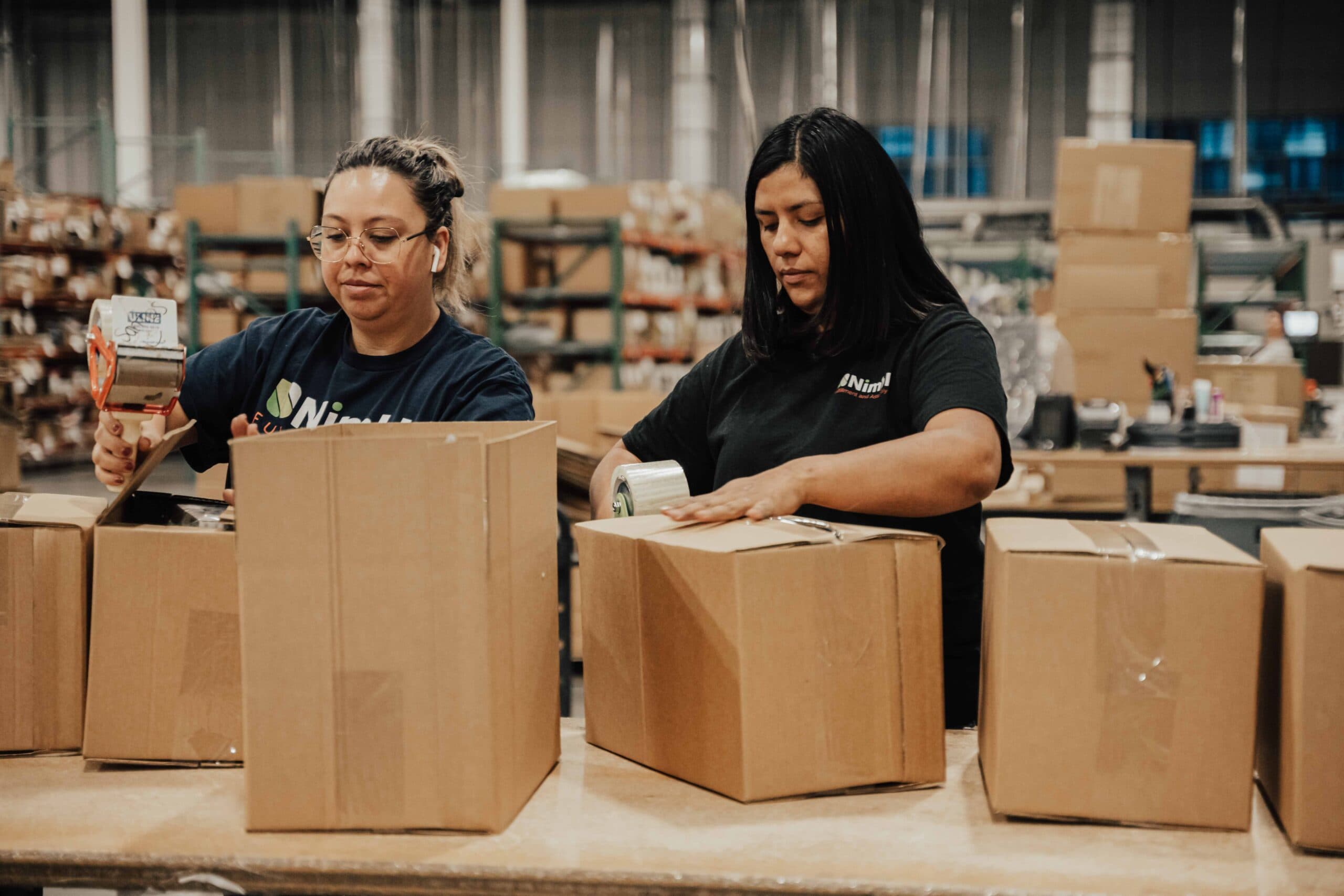 Subscription box fulfillment operation with packaged boxes ready to ship